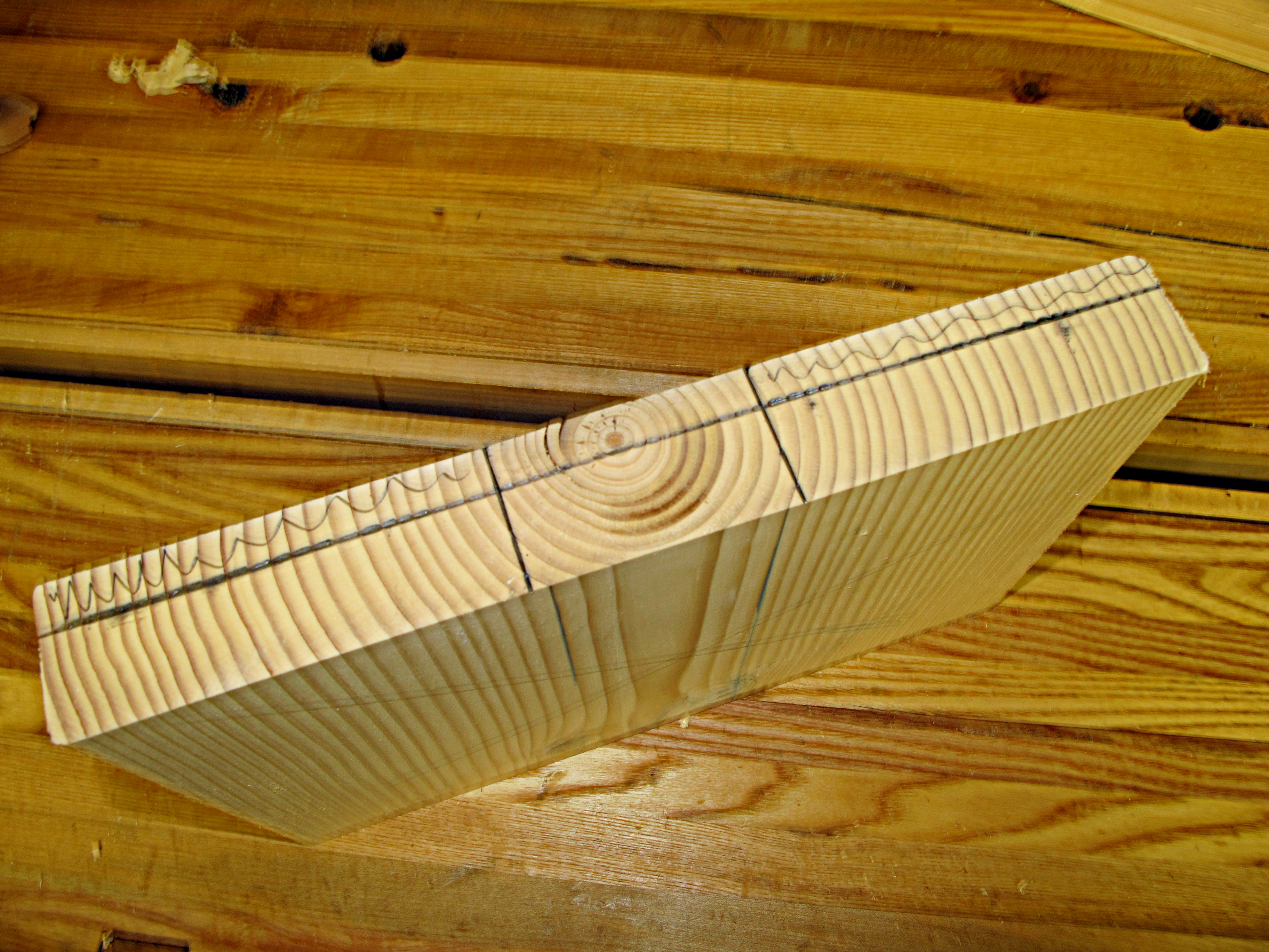 Fig. 2 -- This piece of timber has been cut right across the centre of ...